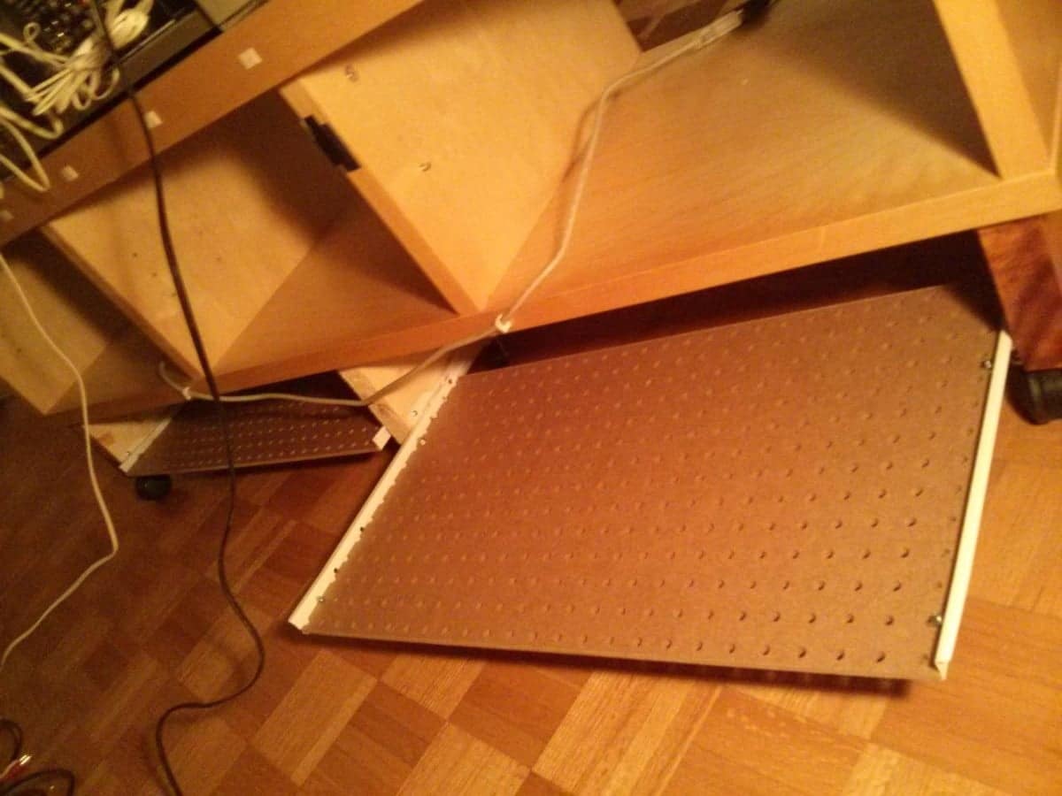A pegboard cable management tray to keep cords off the floor - IKEA Hackers