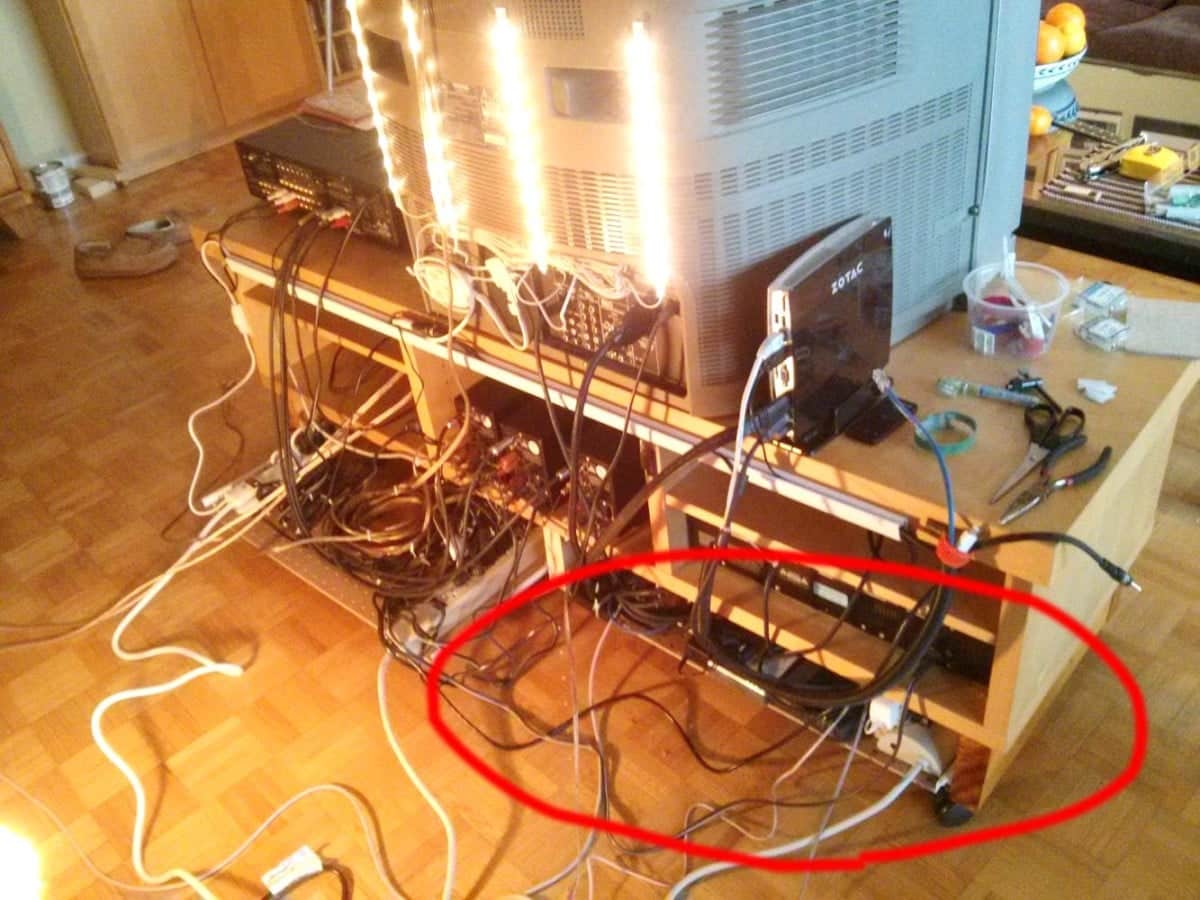 A pegboard cable management tray to keep cords off the floor - IKEA Hackers
